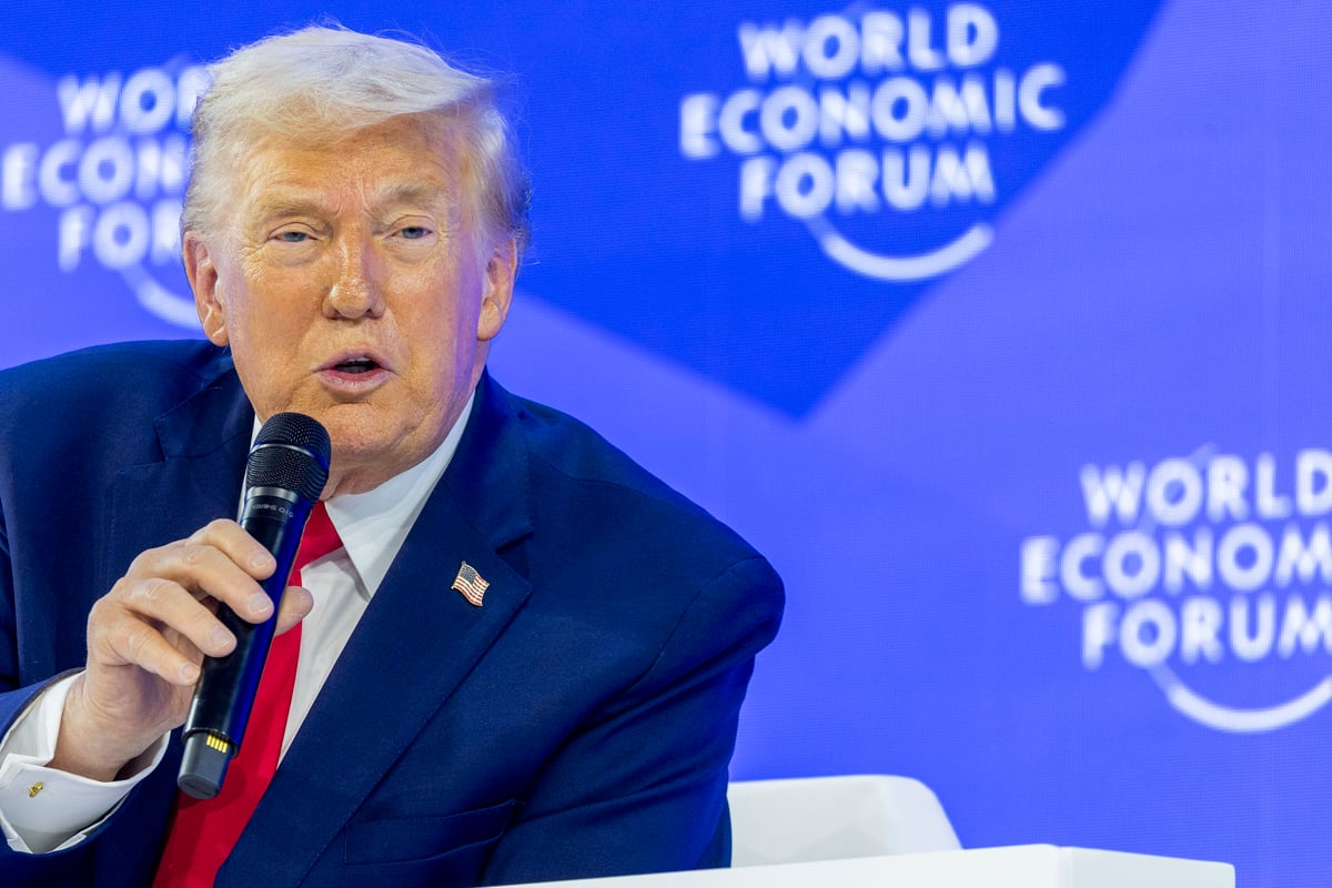 Trump plays nice to EU at Davos, in speech littered with racist slurs